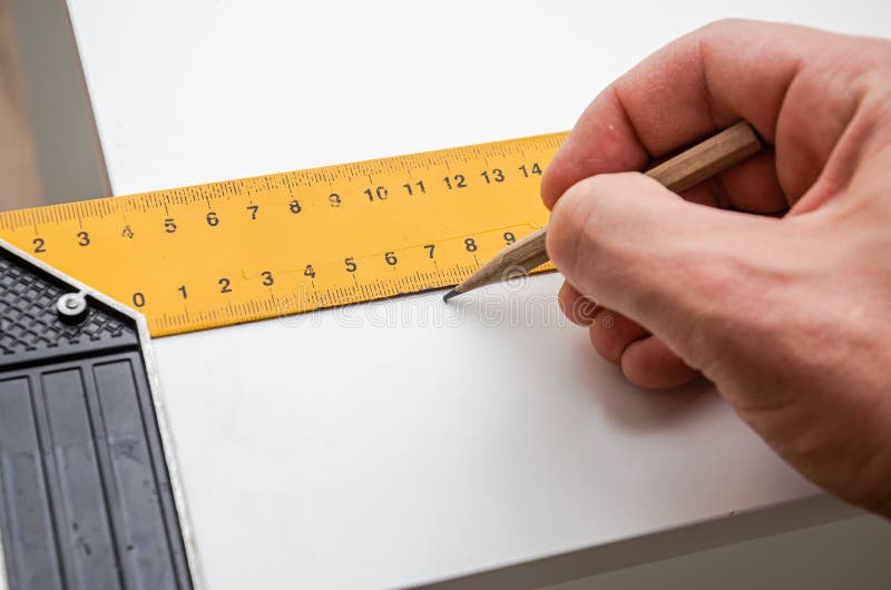 The Master Furniture Maker Draws a Line, Marking the Size on the ...