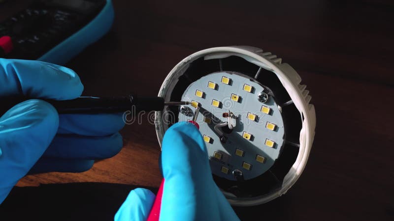 Master Hands Fixing Led Lamp by Multimeter Probes Stock Footage - Video ...