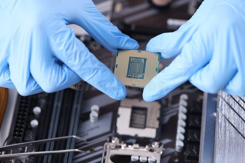 Master Holds Microcircuit Over Computer Boards Closeup Stock Image ...