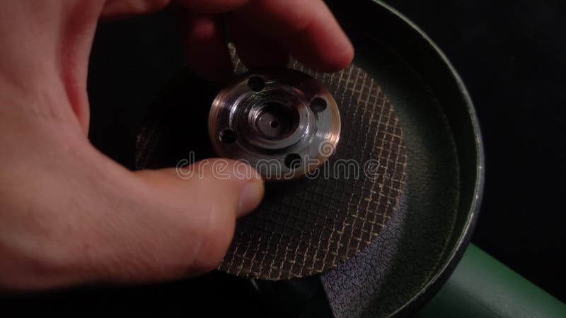 The Master Installs a Disc on an Angle Grinder Stock Video - Video of ...