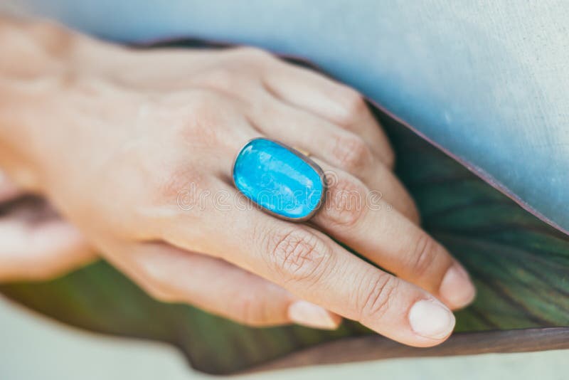 Master Jeweler Produces a Gold Ring with a Big Blue Stone Stock Image ...