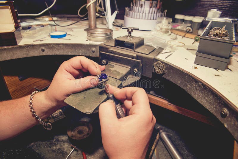 Master Jeweler Produces a Gold Ring Stock Image - Image of master, blue ...