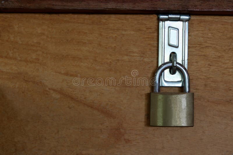 Master Key is Lock on Wood Background, Blank on Left Background for ...