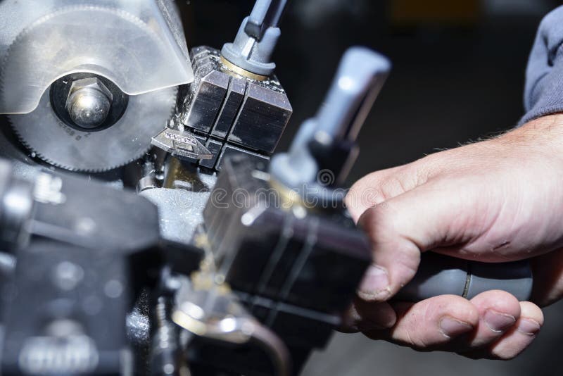 Master on the Lathe Makes the Key To the Lock from the Metal Workpiece ...