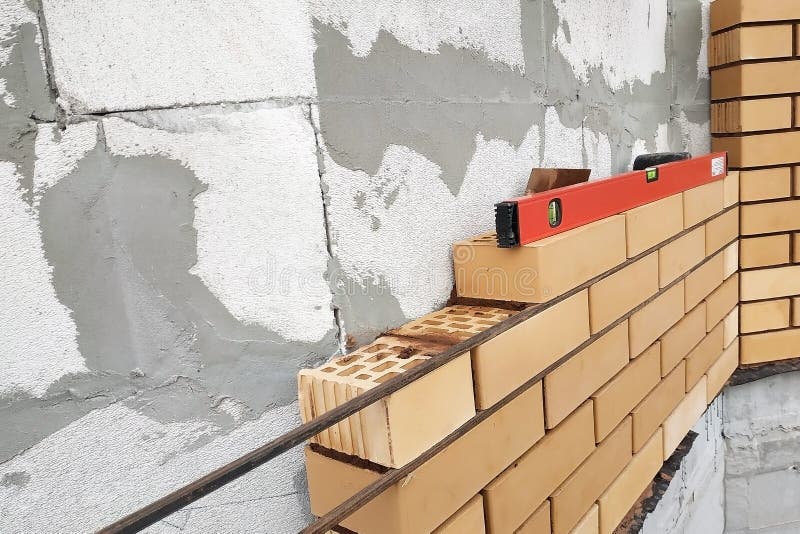 The Master after Laying the Level To the Brick, Looks at the Level ...