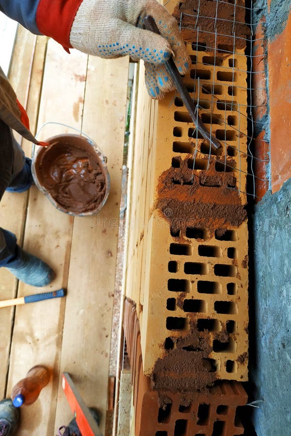 The Master Lays Masonry Silicate Brick, the Walls and Facade of the ...
