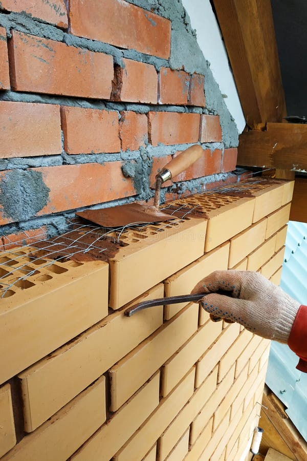 The Master Lays Masonry Silicate Brick, the Walls and Facade of the ...