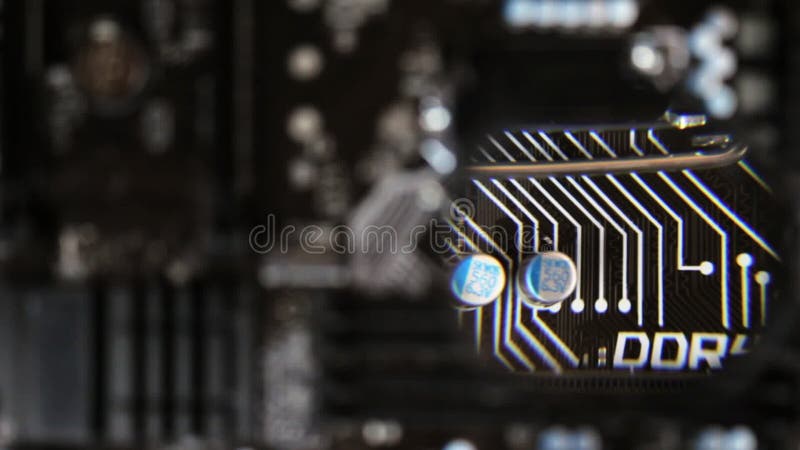 Man Looks at Motherboard through Microscope among Stock Video - Video ...
