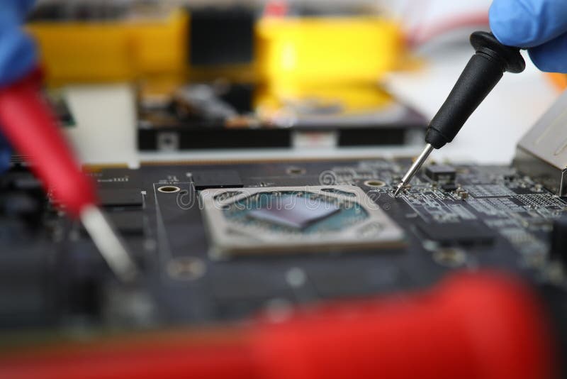 Master Makes Diagnostics of Motherboard with Tester. Stock Image ...