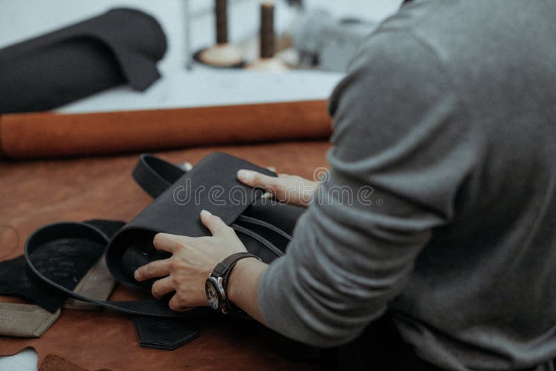 The Master Makes a Leather Bag. a Close Up, a Product from Skin in ...