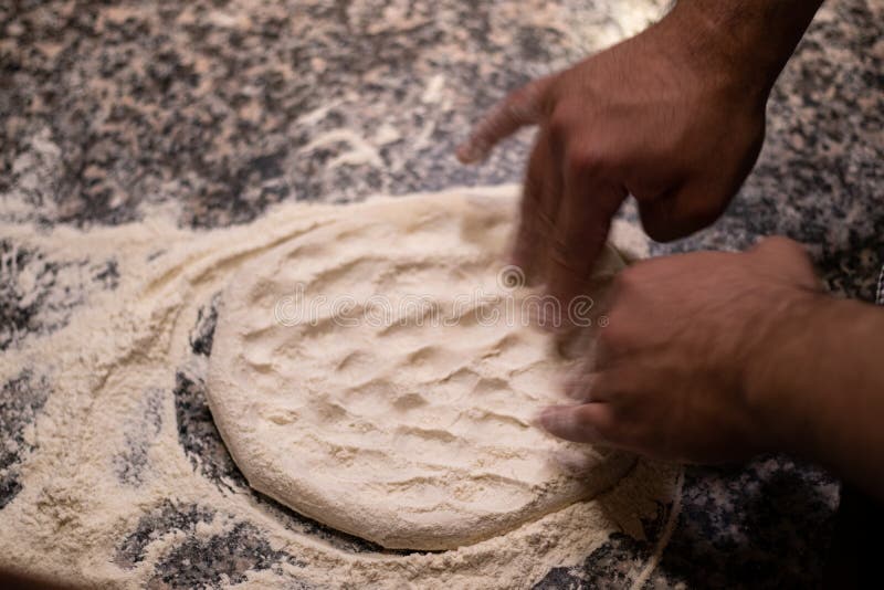 Pizza dough making process stock photo. Image of wheat - 241641644