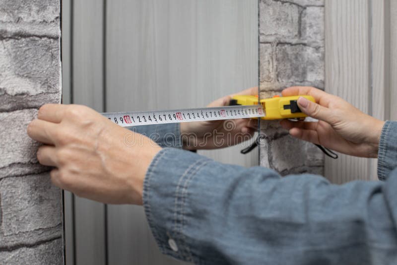 The Master Measures the Width of the Mirror. Stock Image - Image of ...