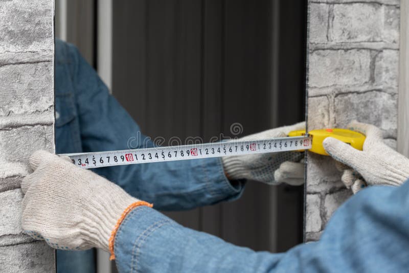 The Master Measures the Width of the Mirror Stock Image - Image of size ...