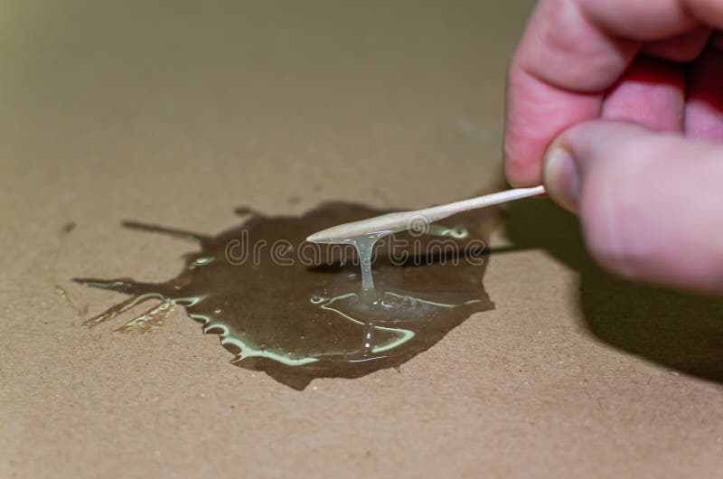 The Master Mixes Glue Epoxy Resin with Thickener Stock Image - Image of ...