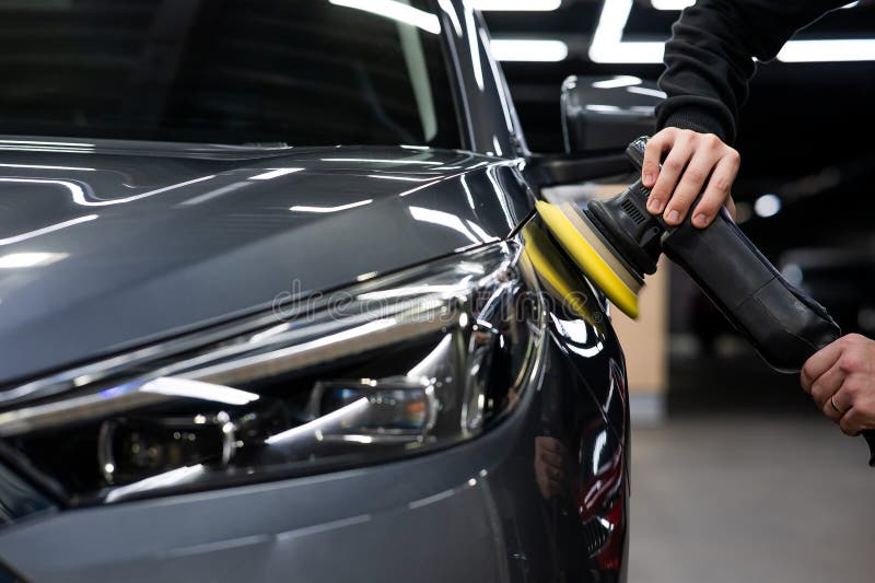 A Master Polishes the Surface of a Car Body. Stock Image - Image of ...