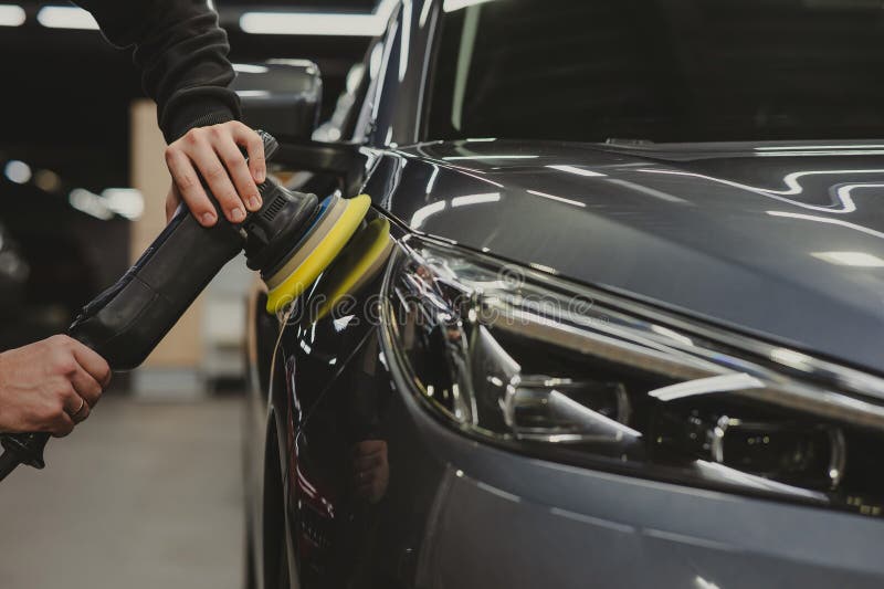 A Master Polishes the Surface of a Car Body. Stock Image - Image of ...