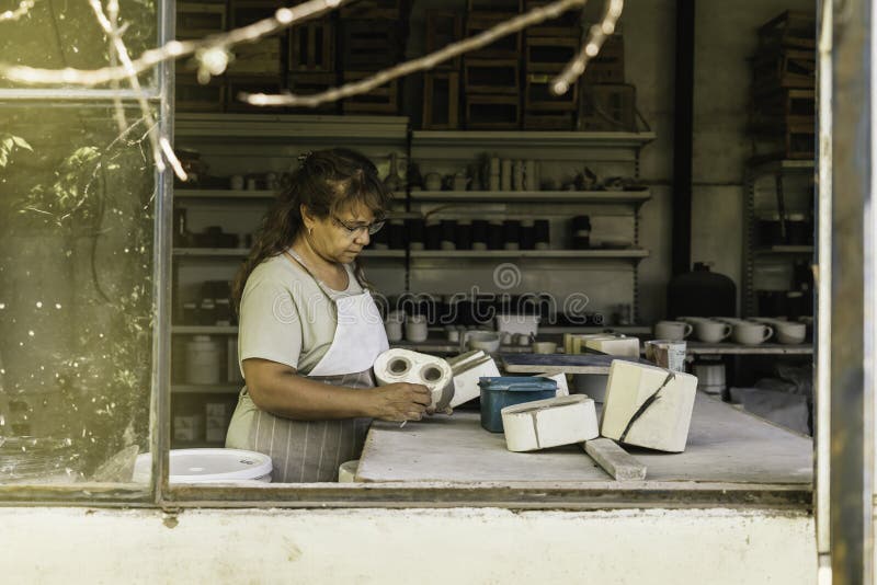 Master Potter Working in Her Studio. Stock Photo - Image of factory ...