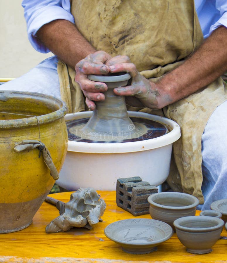 Master Potter Working at the Potter`s Wheel Stock Photo - Image of ...