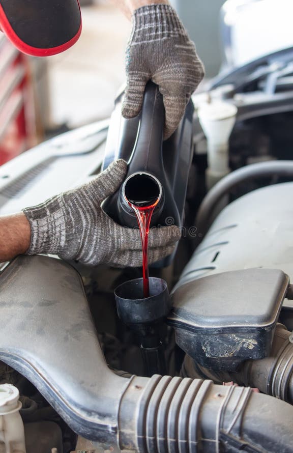 The Master Pours Oil into the Car S Variator Stock Image - Image of ...