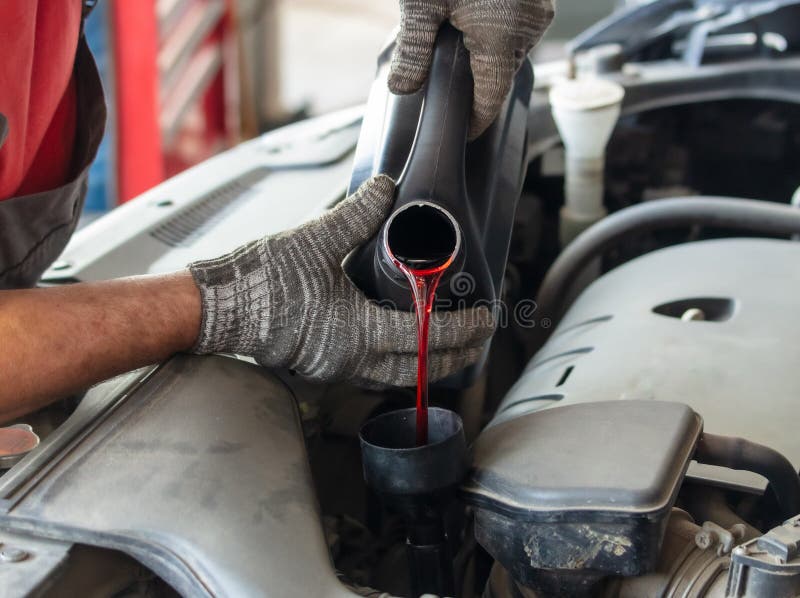 The Master Pours Oil into the Car S Variator Stock Image - Image of ...