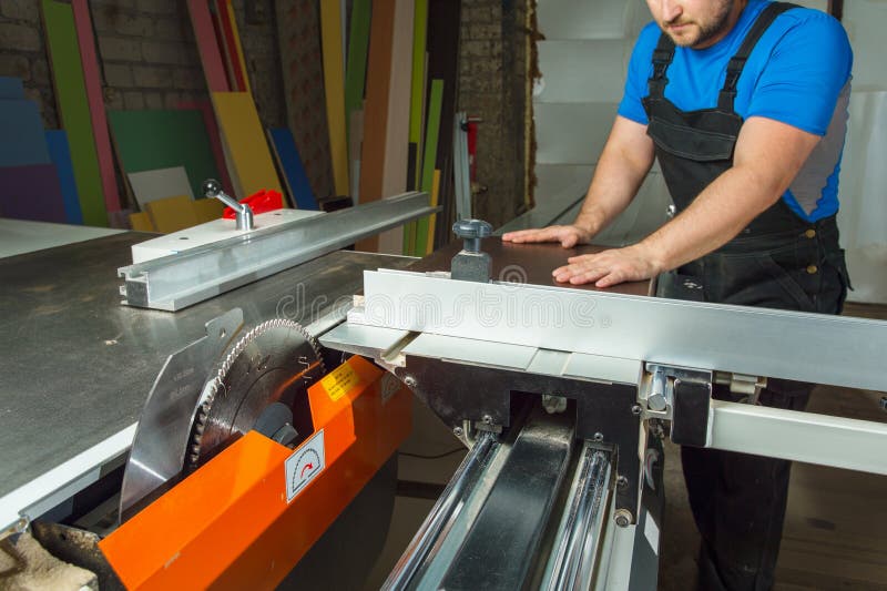 The Master Prepares the Workpiece for Cutting on a Circular Machine ...