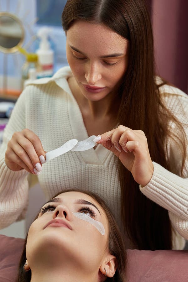 Master Preparing Glue Cotton Tape Under Eye. Stock Image - Image of false, treatment: 298642725