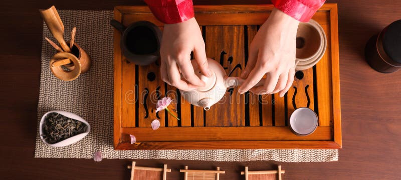 Master Preparing for Traditional Tea Ceremony at Wooden Table, Top View ...