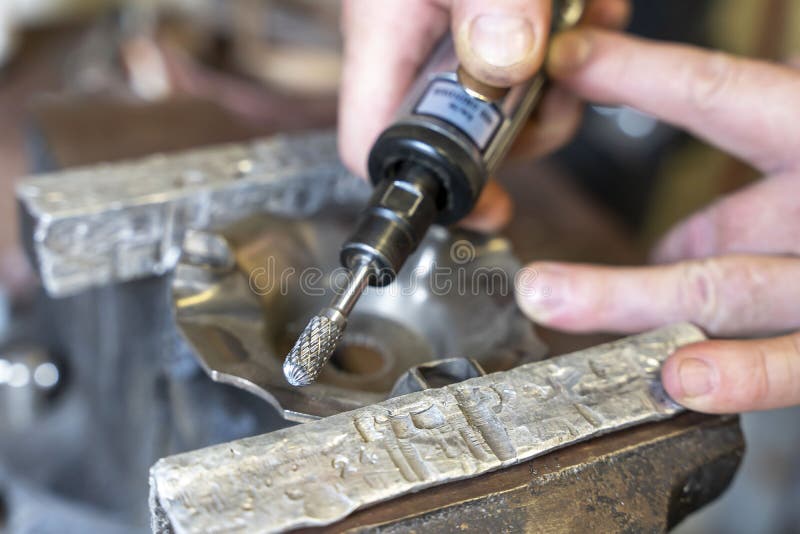 The Master Processes the Tree with a Multi-tool Stock Photo - Image of ...