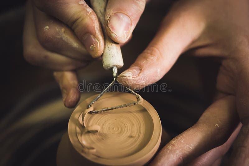 Master Removes the Top Layer of Clay on Pot with a Special Tool. Stock ...