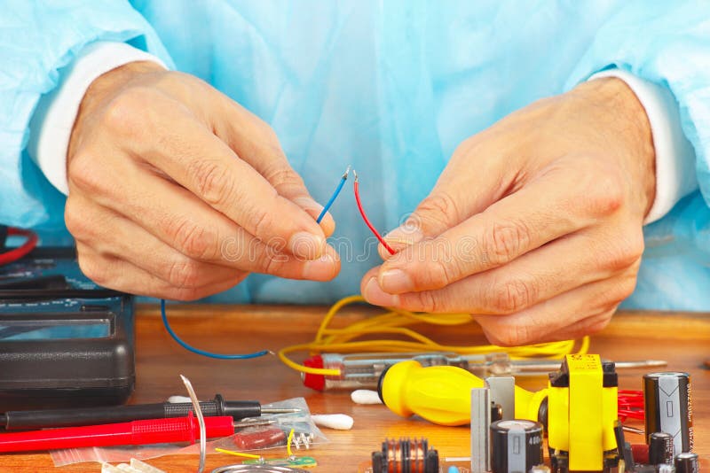 Master Repairing Electronic Devices in Service Workshop Stock Photo ...