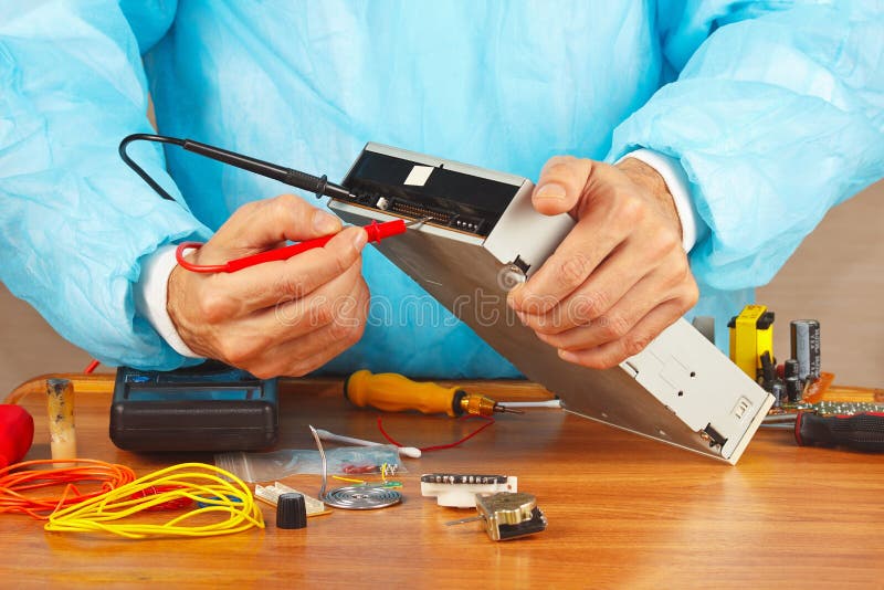 Master Repairing Electronic Devices in Service Workshop Stock Photo ...