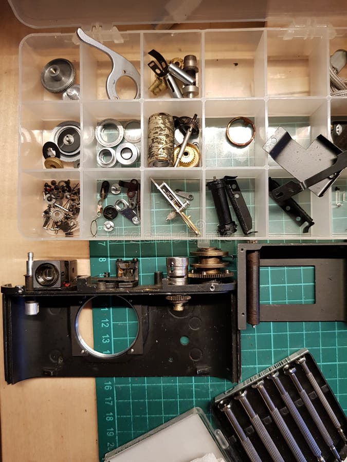 Master Repairing an Old Camera Stock Image - Image of black, repairing ...