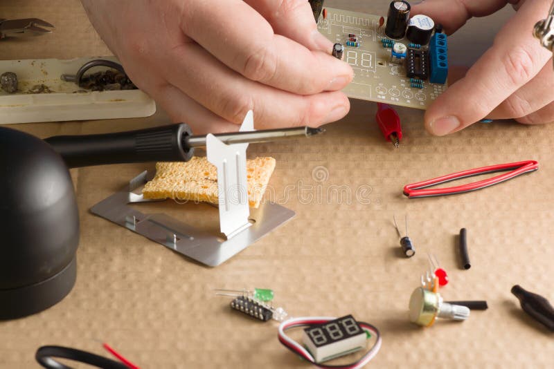 Master in repair shop stock image. Image of shop, solder - 105588651