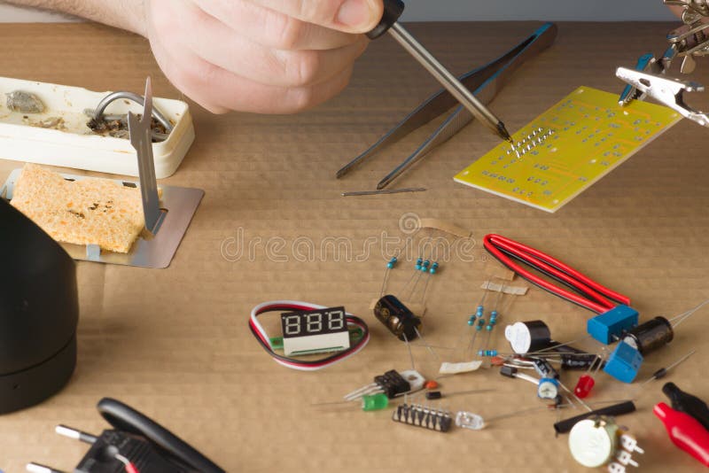 Master in repair shop stock image. Image of home, solder - 98946123