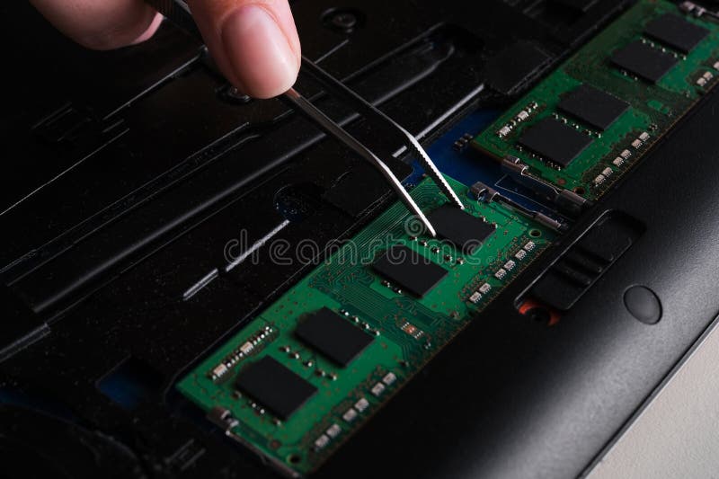 Master Repairs Laptop and System Board Close-up Stock Photo - Image of ...