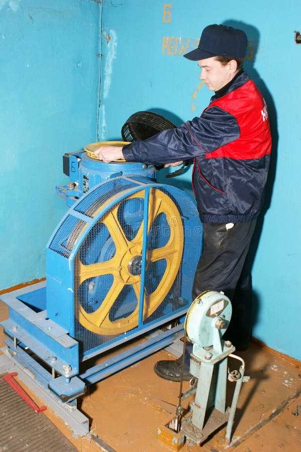 Master repairs the lift editorial stock photo. Image of process - 20744823