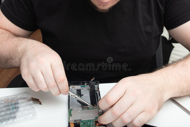 The Master Repairs the Mobile Phone, Install Spare Parts with Special ...