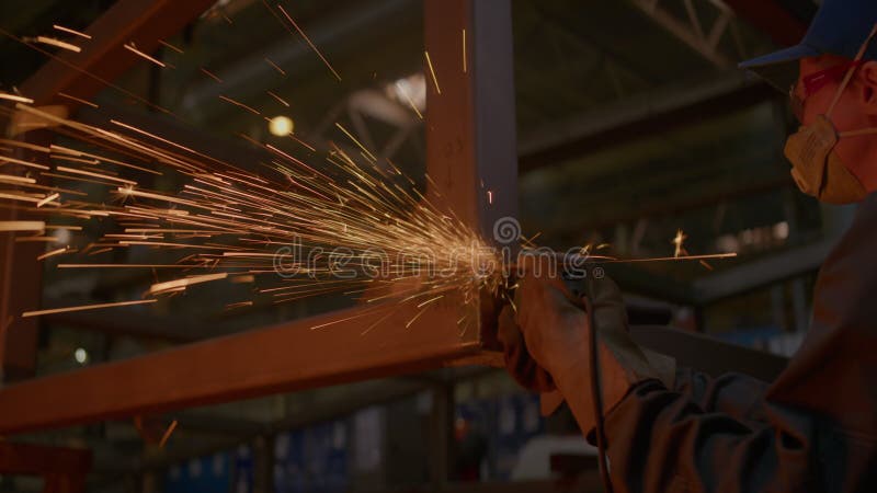 Master in Respirator Refines Metal Edge Using Angle Grinder Stock Video ...