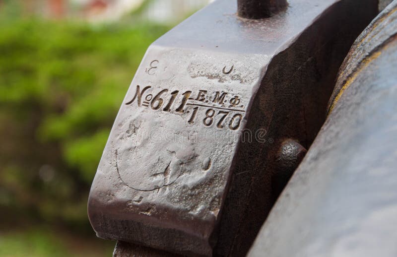 Master`s Mark on an Ancient Iron Cannon Stock Photo - Image of ball ...