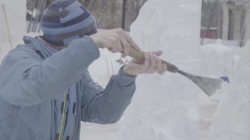 Master Scraper Performs a Movement Across the Ice To Create an Ice ...
