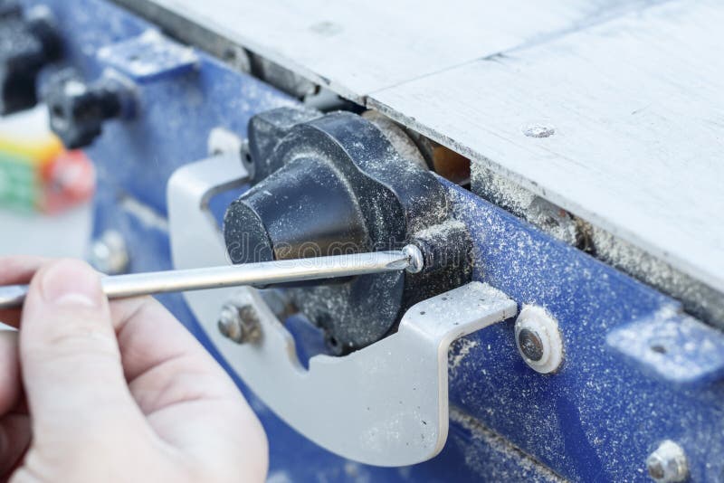 Master Screwdriver To Disassemble the Machine. Saw for Cutting Wood ...