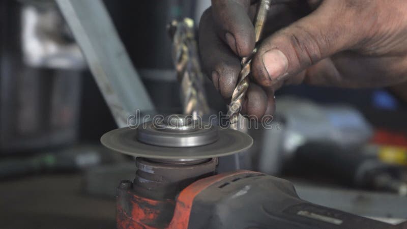 A Master Sharpens a Drill Using an Emery Disc Stock Footage - Video of ...