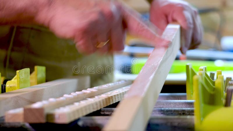 The Master Smears the Tablet with Glue Stock Footage - Video of build ...