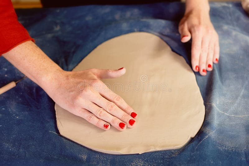 Master Smoothes the Layer of Clay with Your Hands.the Ceramist ...
