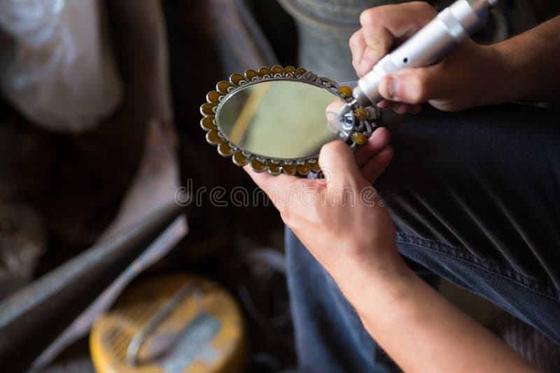 The Master the Special Tool Puts Drawing on a Mirror.Engraving on ...