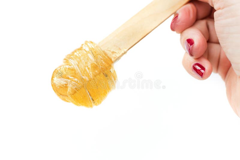 A Master Stir the Sugar Paste before Removing Unwanted Hair. Sugaring ...