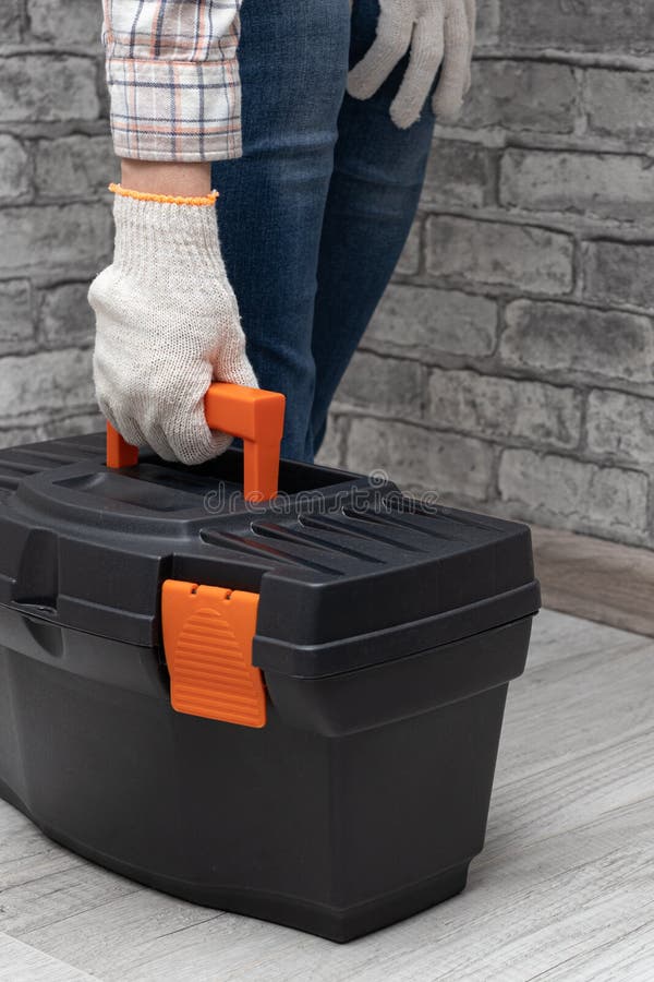 The Master Takes the Toolbox by the Handle. Stock Image - Image of ...