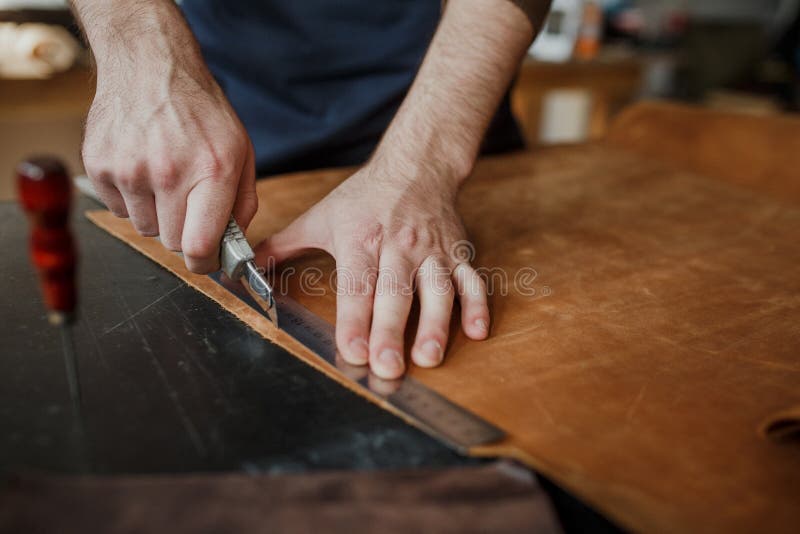 Process of Revealing Piece of Leather in Workshop Stock Photo - Image ...