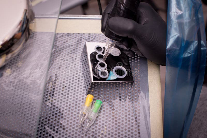 Master Tattoo Artist Prepares Tools for Tattooing Stock Image - Image ...