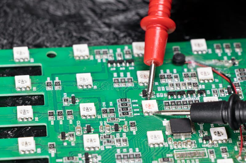 The Master Tests the LEDs on the Microcircuit Using a Multi-meter ...